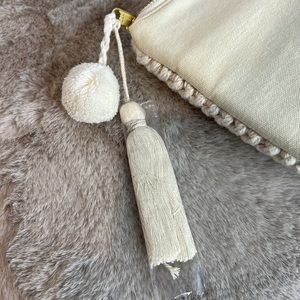 Enchante Accessories | Bags | Crocheted Clutch With Tassel And Puff ...